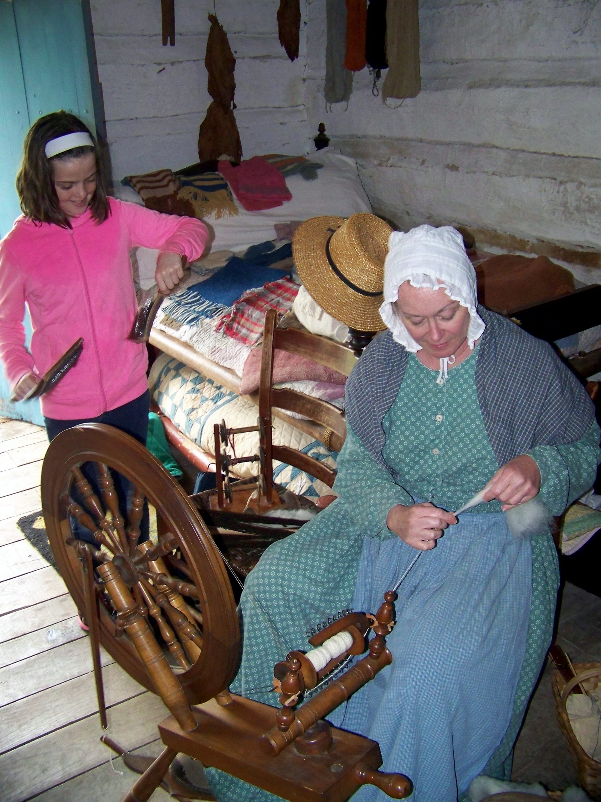 Lincoln Log Cabin Demonstrates the Many Steps of Turning Wool into ...